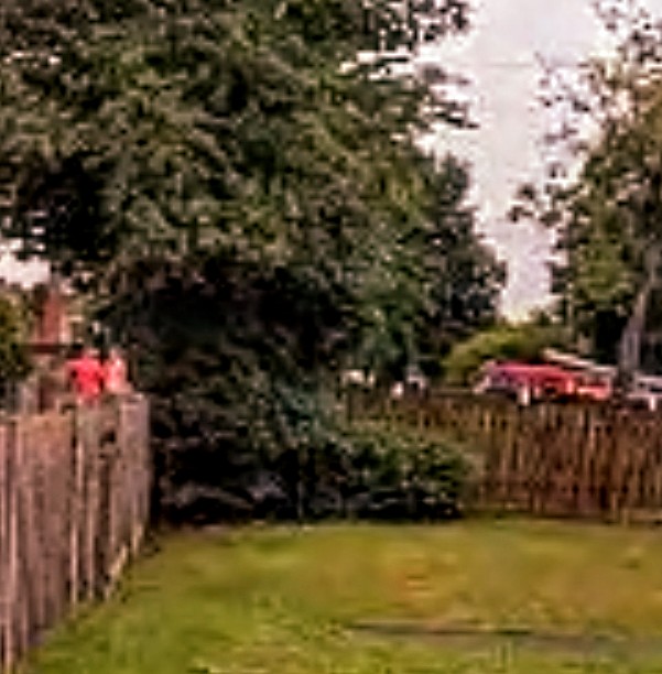 Police tape off a walkway in Partington after a serious incident at a ...